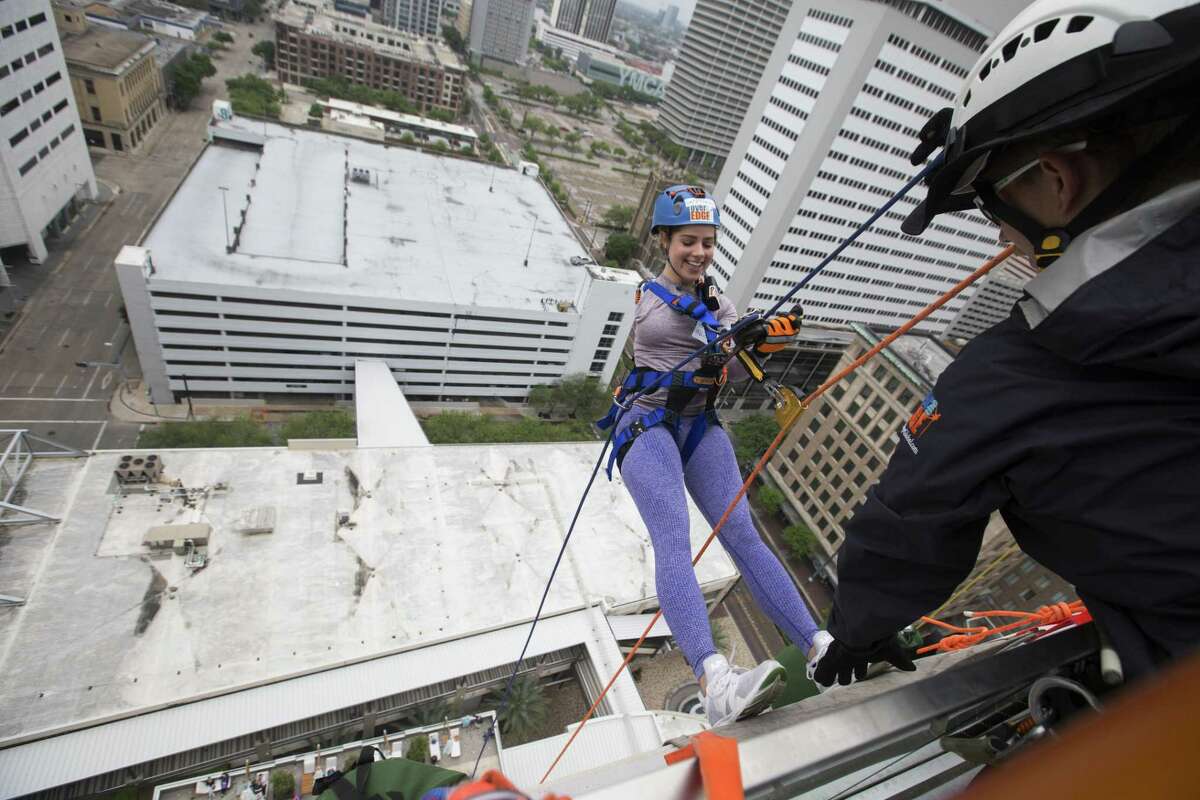 Fearless Faith: Rappelling down a skyscraper to benefit barrier-free camp