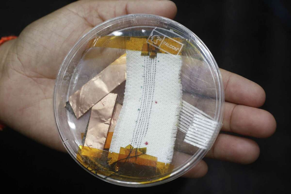 Self-cleaning space suit could help NASA astronauts avoid harmful dust ...