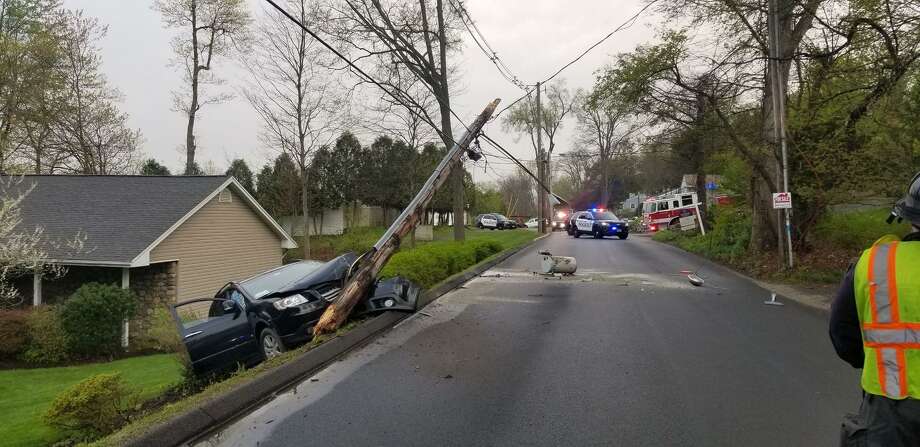 Car hits utility pole, shuts down Payne Road - NewsTimes