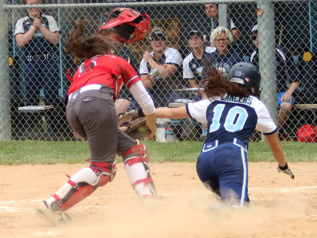 PREP SOFTBALL: Surging Lancers knock Redbirds off pace in SWC race