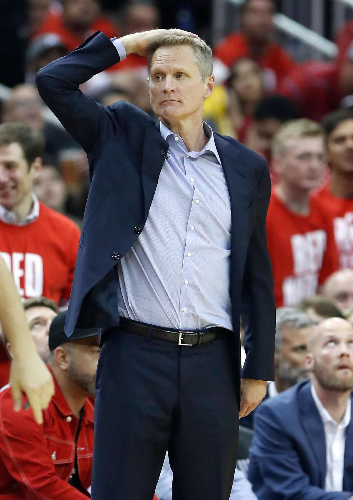 Rockets hold off Warriors, even series