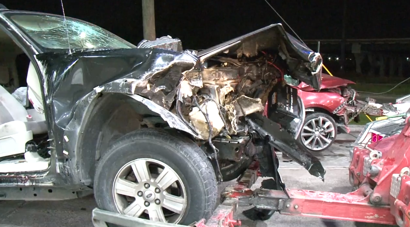 Woman cut from car after violent collision in east Houston