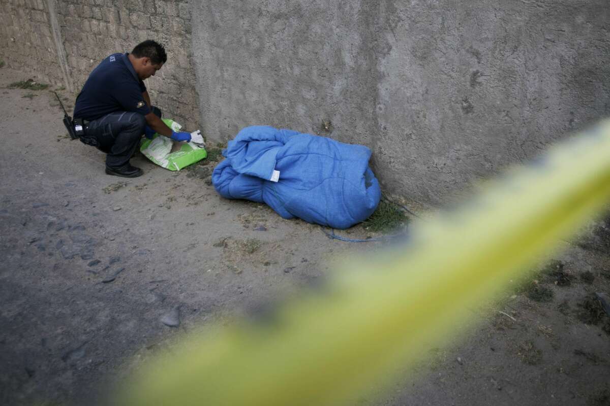 Mexican authorities find 18 bags and containers containing human remains