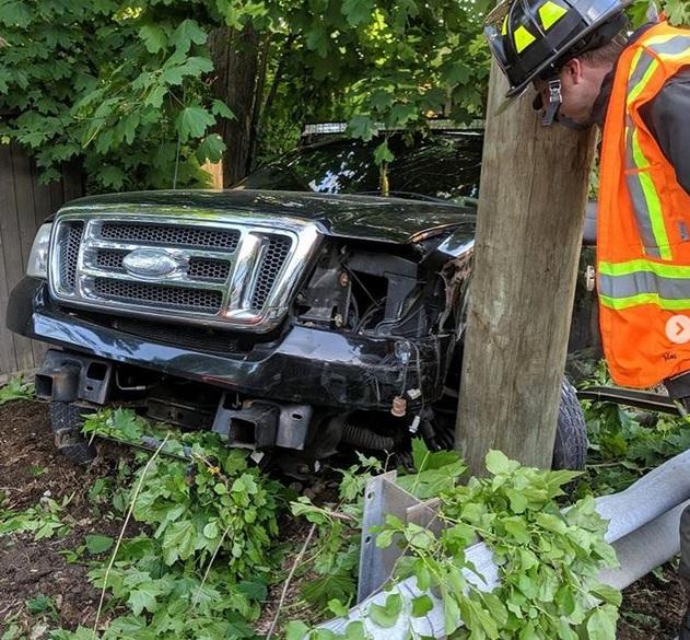 Driver escapes serious injury after truck hits Westport pole
