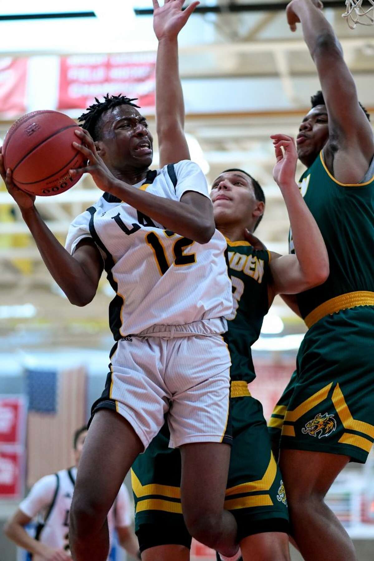 SCC boys basketball: Jonathan Law falls to Hamden in overtime