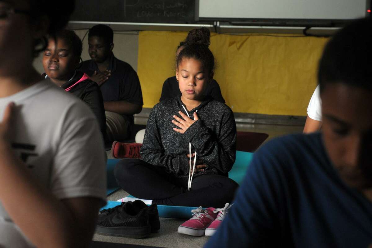 Bridgeport school turns to yoga to help calm students