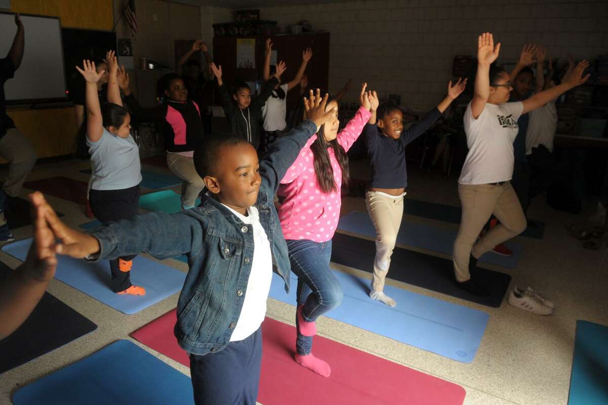 Bridgeport school turns to yoga to help calm students