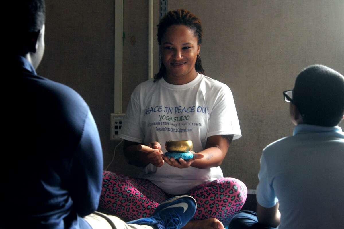 Bridgeport school turns to yoga to help calm students