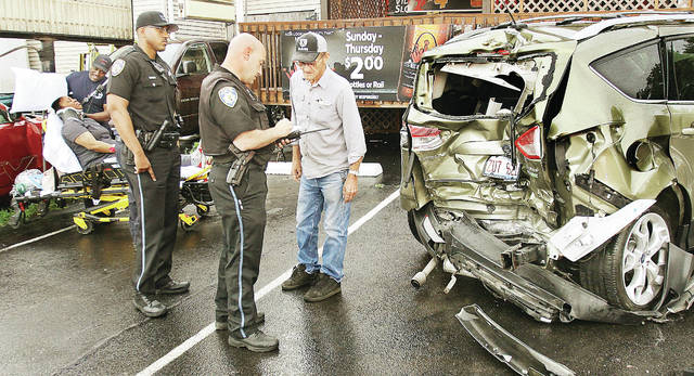 Rear-ended by semi, woman hurt as car crunches into Riverside Saloon’s deck