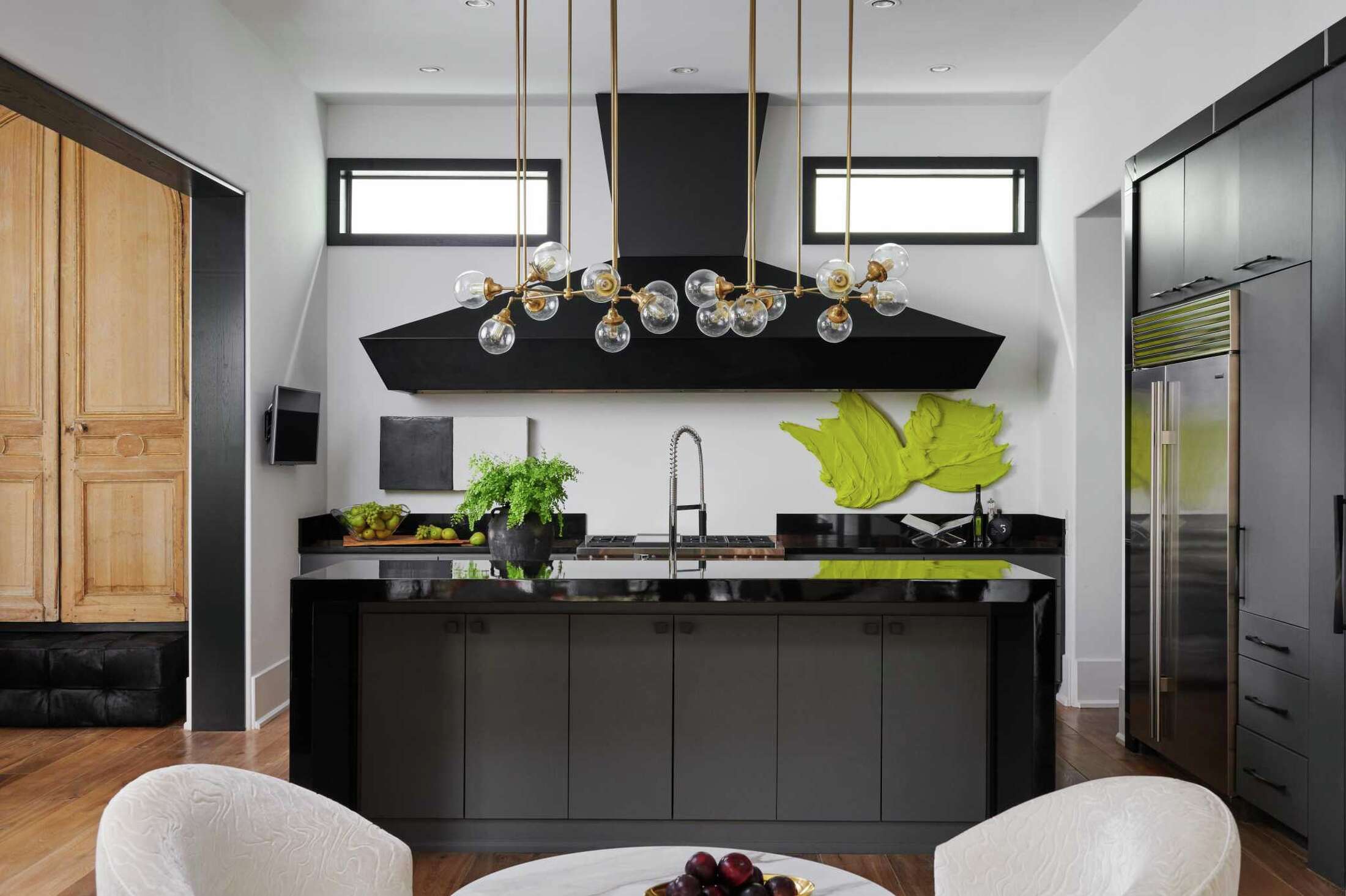 Designer Janet Gust’s Galleria-area home whimsically blends antique and ...