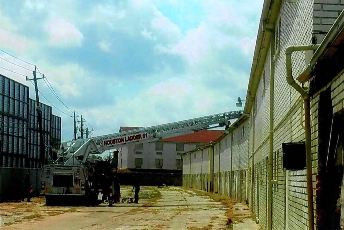 HFD, loved ones return to Southwest Inn fire site to remember fallen ...