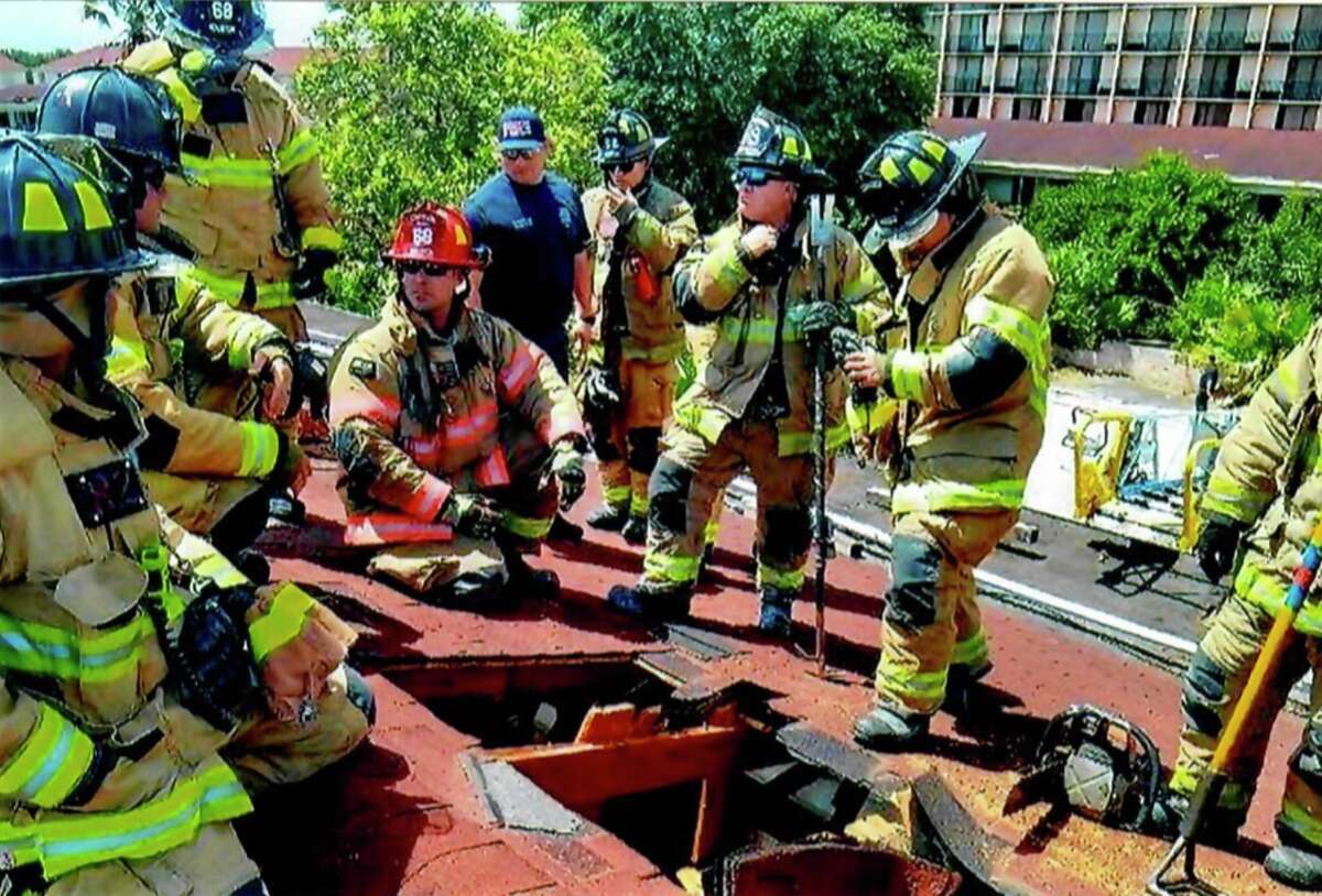 HFD, loved ones return to Southwest Inn fire site to remember fallen ...