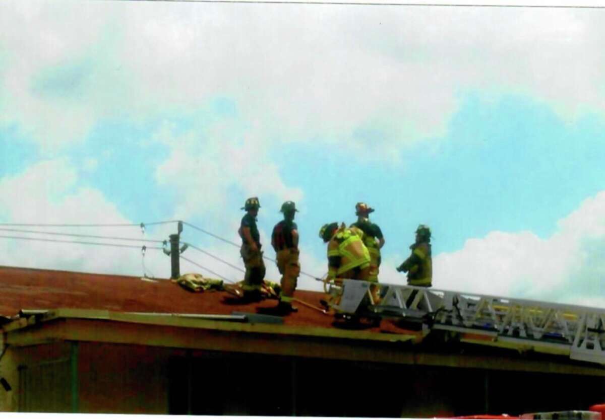 HFD, loved ones return to Southwest Inn fire site to remember fallen ...