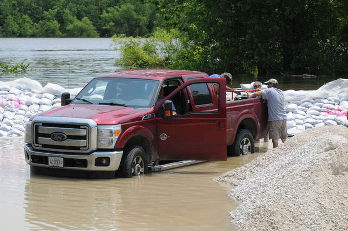 Joe Page Bridge in Hardin closes after Nutwood Levee in Calhoun County ...