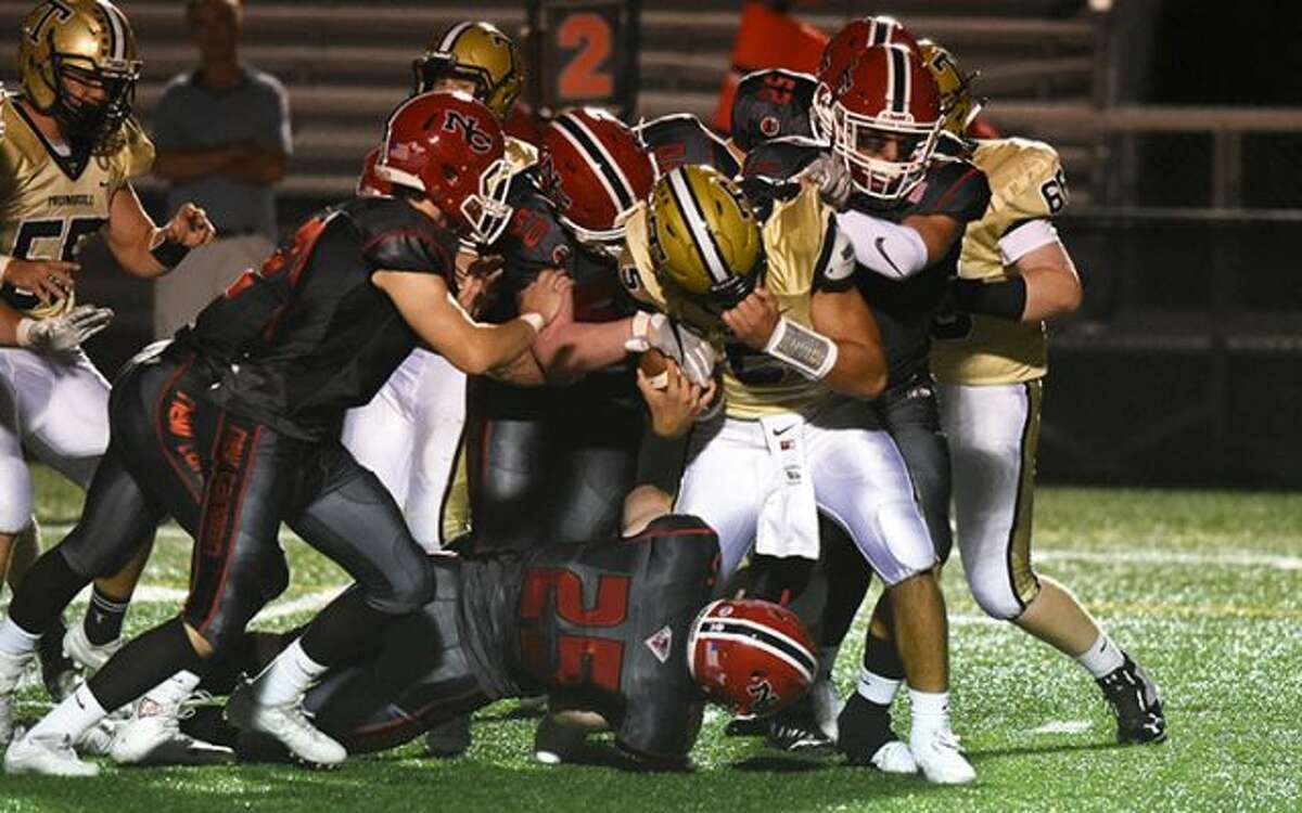 Trumbull Eagles grounded by New Canaan football, 61-14