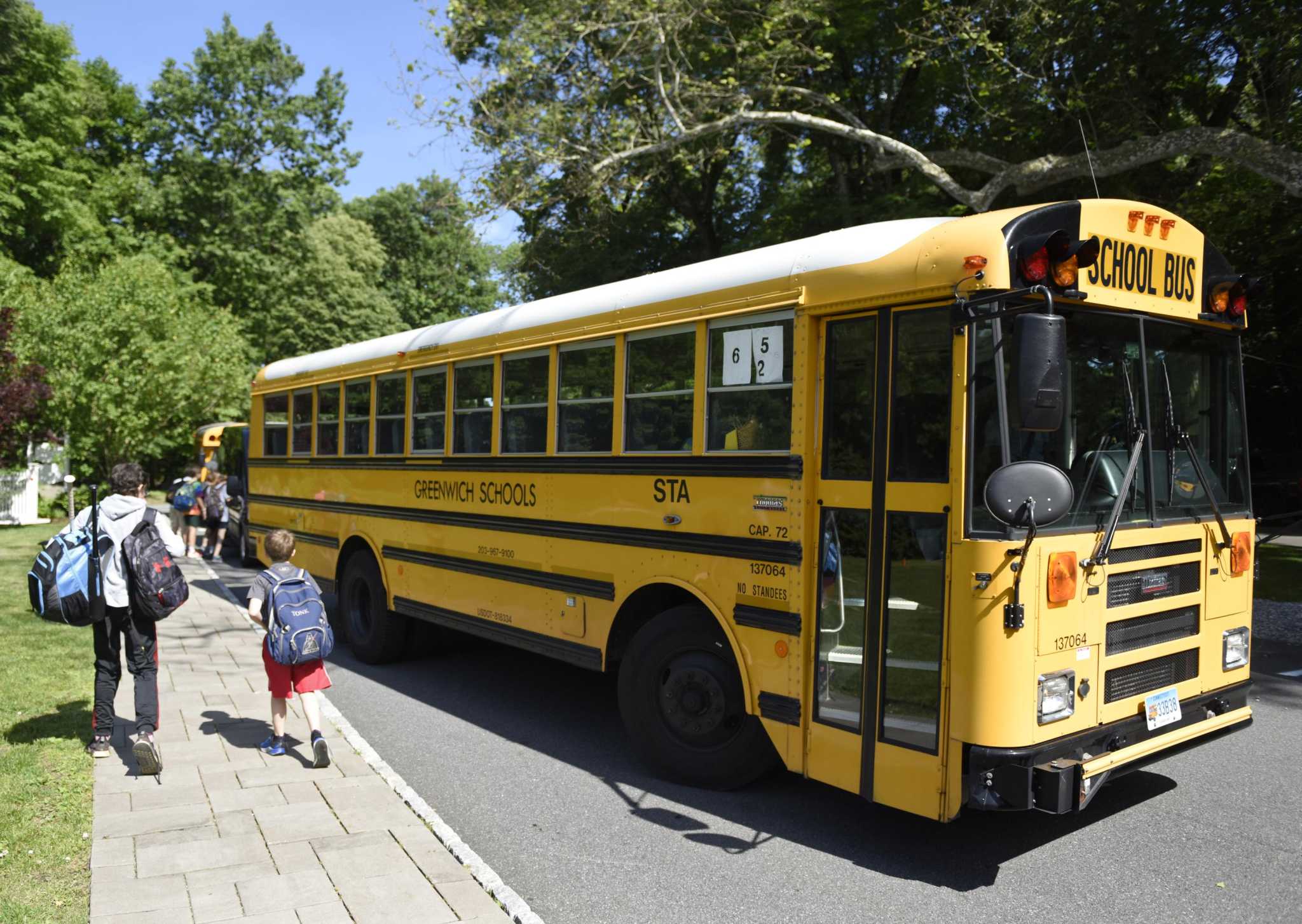 Greenwich cancels buses to private school in town