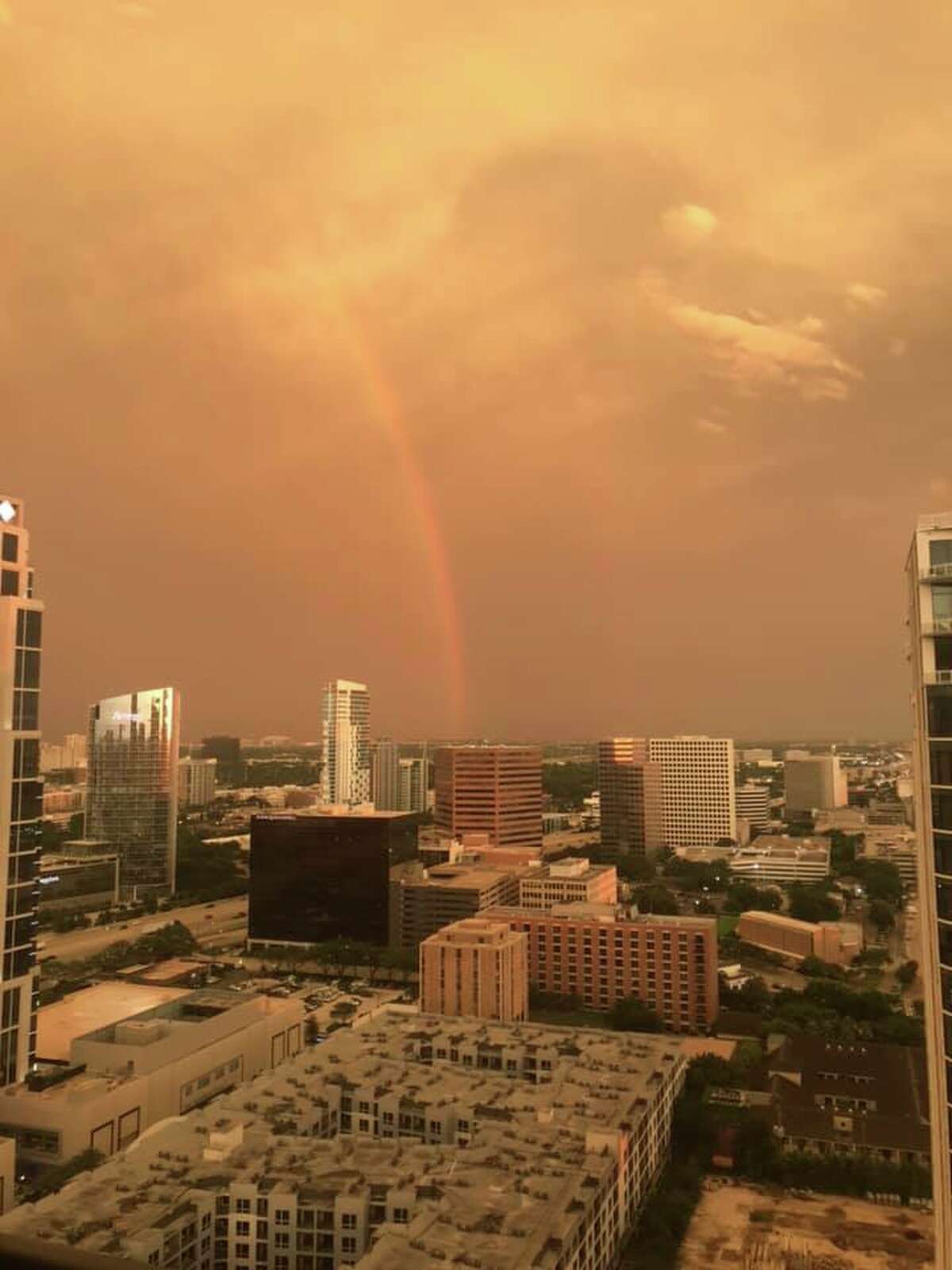 Houstonians get their cameras out as double rainbow appears over city