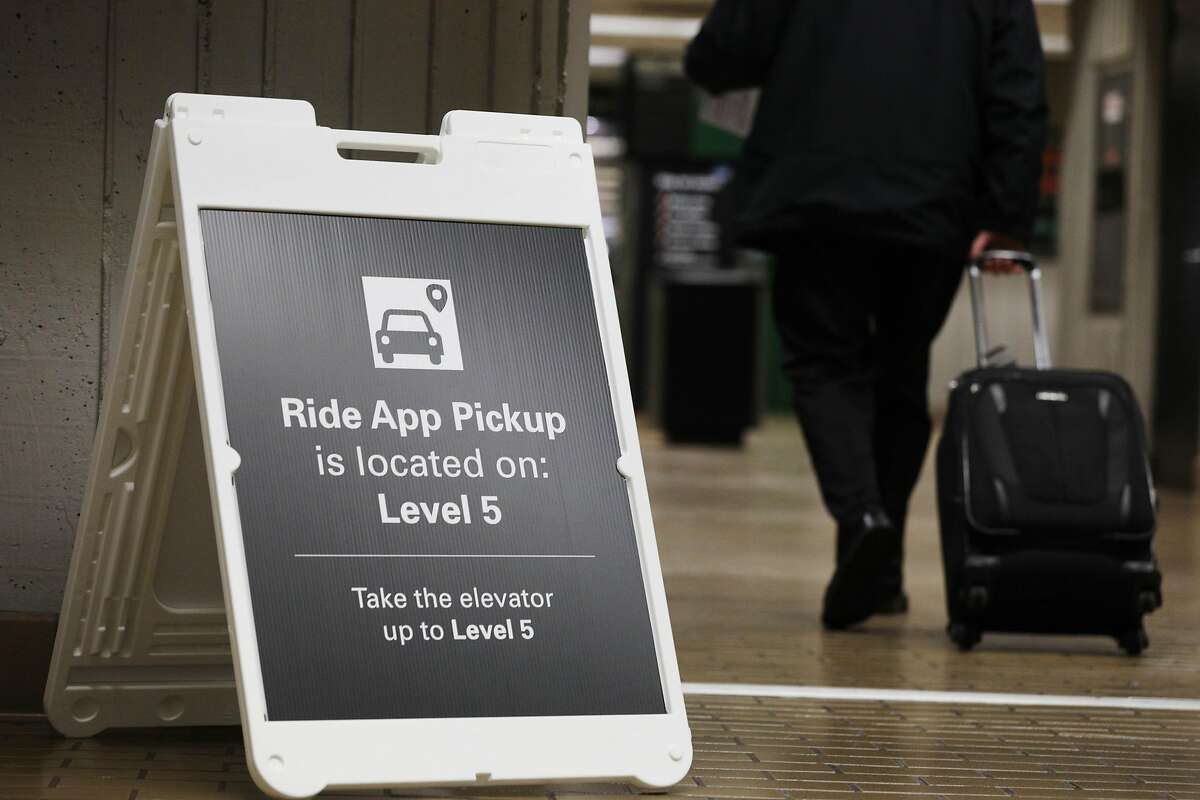 Uber, Lyft riders find longer waits, backups with new SFO pickup plan