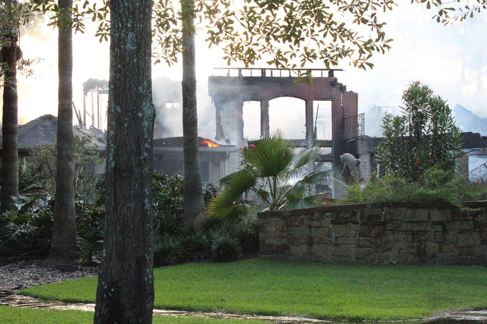 2 injured as massive mansion in The Woodlands is destroyed in fire