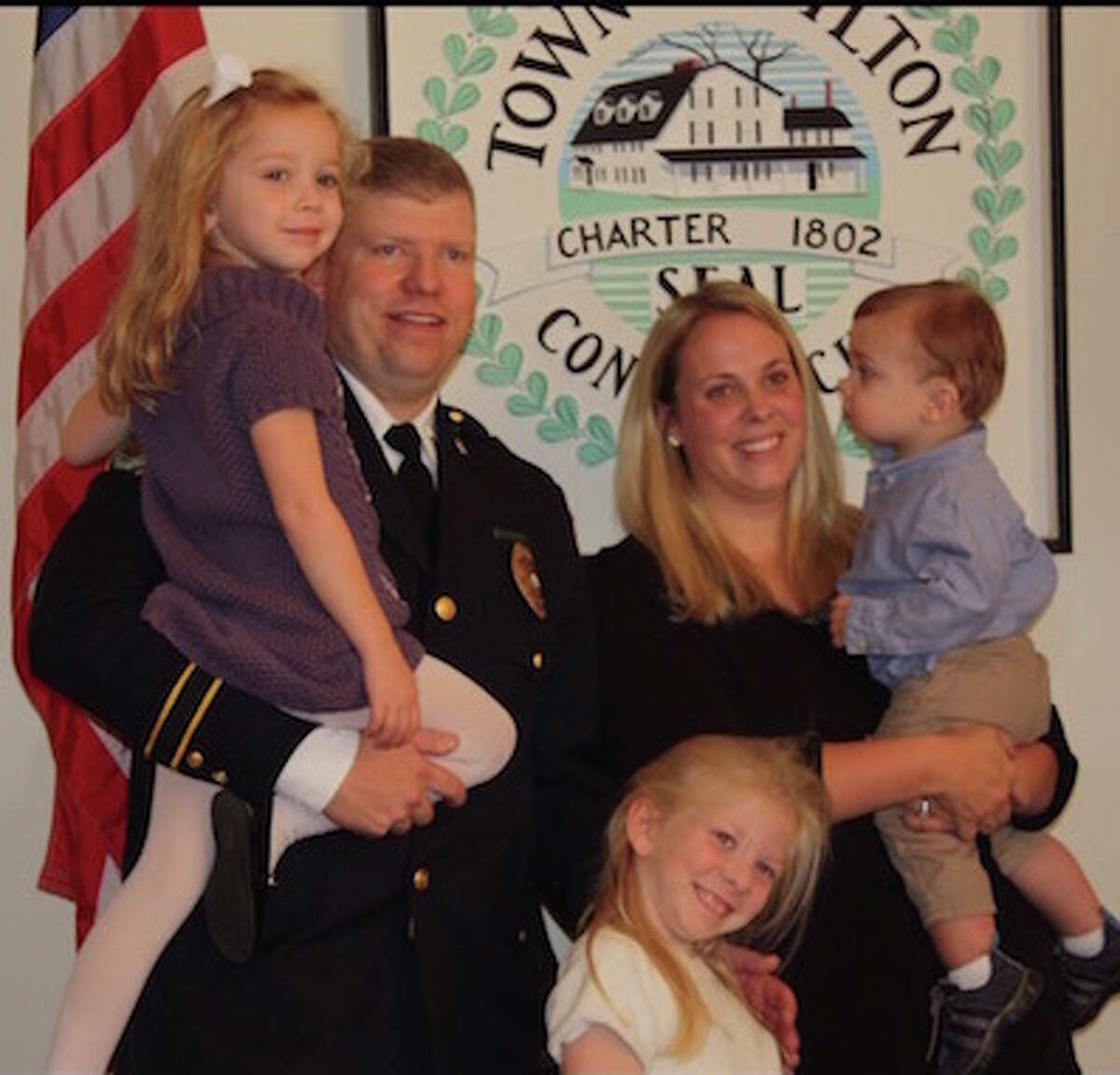 Wilton officer's family back home 11 months after fire
