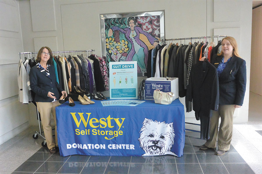 Wilton women donate business clothing