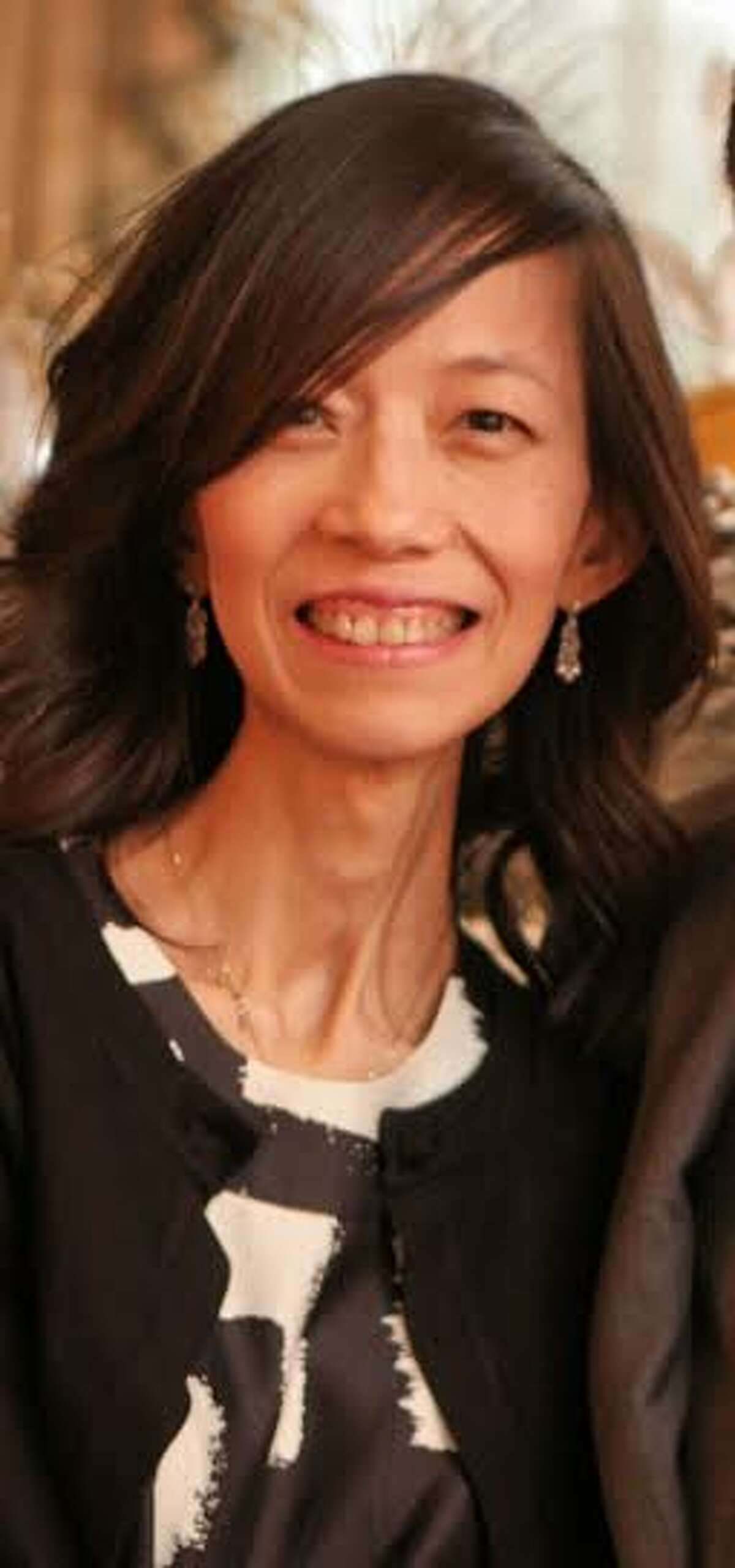 Po-Yan Joyce Cheung, 49, wife and mother; services on Dec. 10