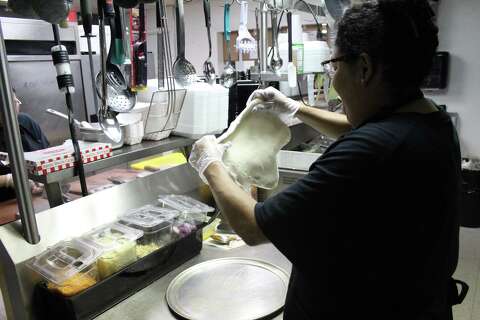 Cleveland pastor has two passions — church, Fat Floyd’s Smokehouse and ...