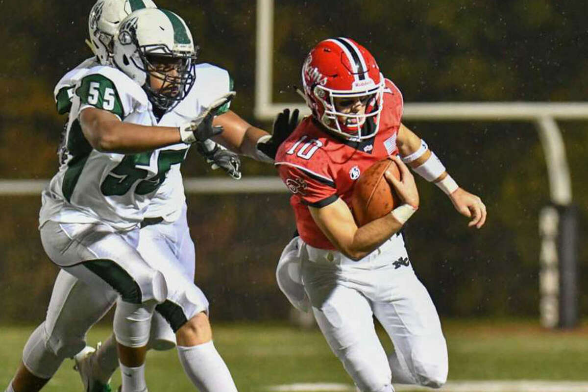 Pyne sets school record for passing yards, leading New Canaan football ...