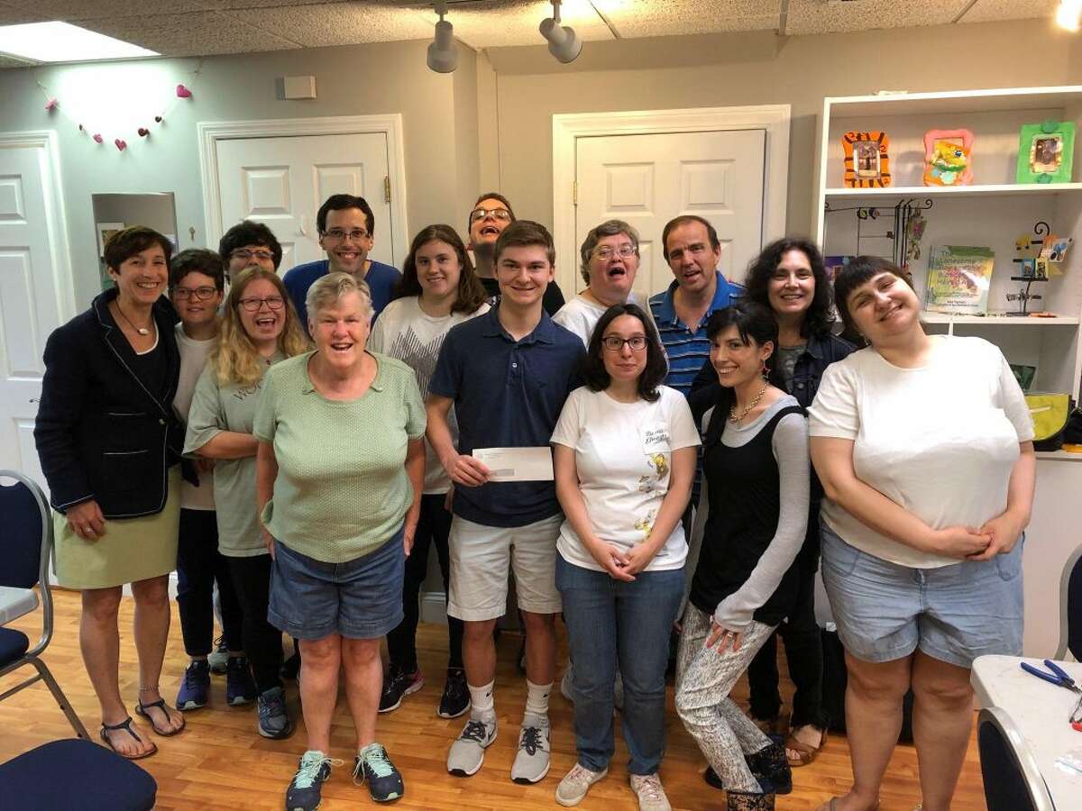 Ridgefield High Investment Club raises money for SPHERE