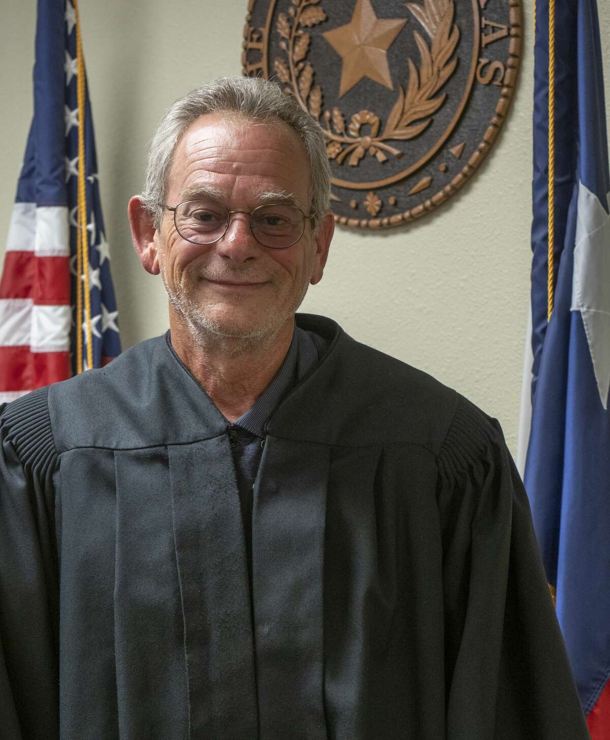 Judge Cobos shaves off beard for charity