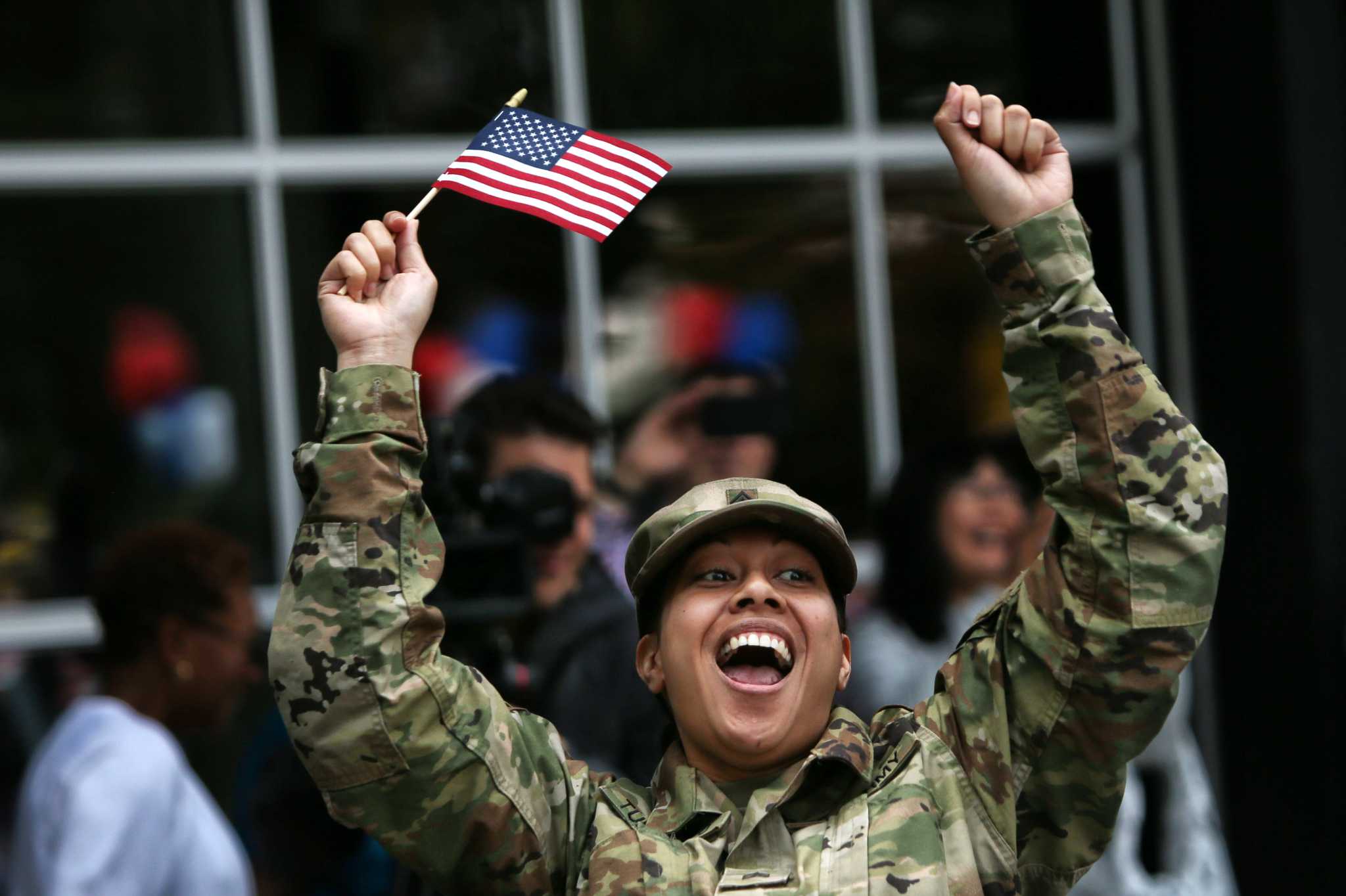A theme as 500 become US citizens at Seattle Center: Immigrants make ...
