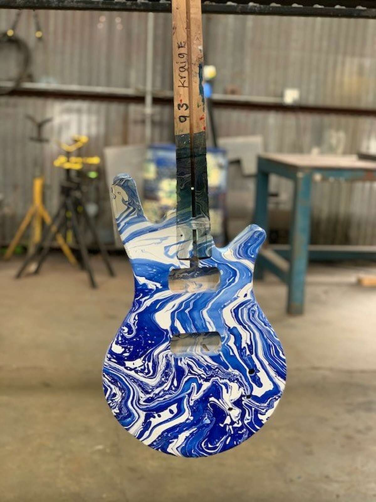 Video shows mesmerizing guitar-dyeing process at workshop in Houston