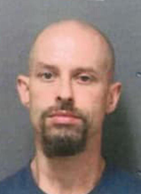 Bank robbery suspect arrested at court