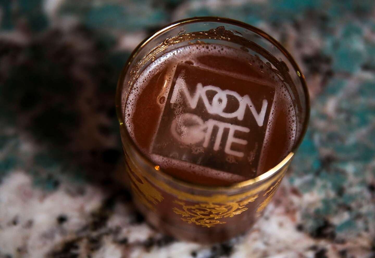 Chronicle critics review Moongate Lounge, the bar above Mister Jiu's in ...