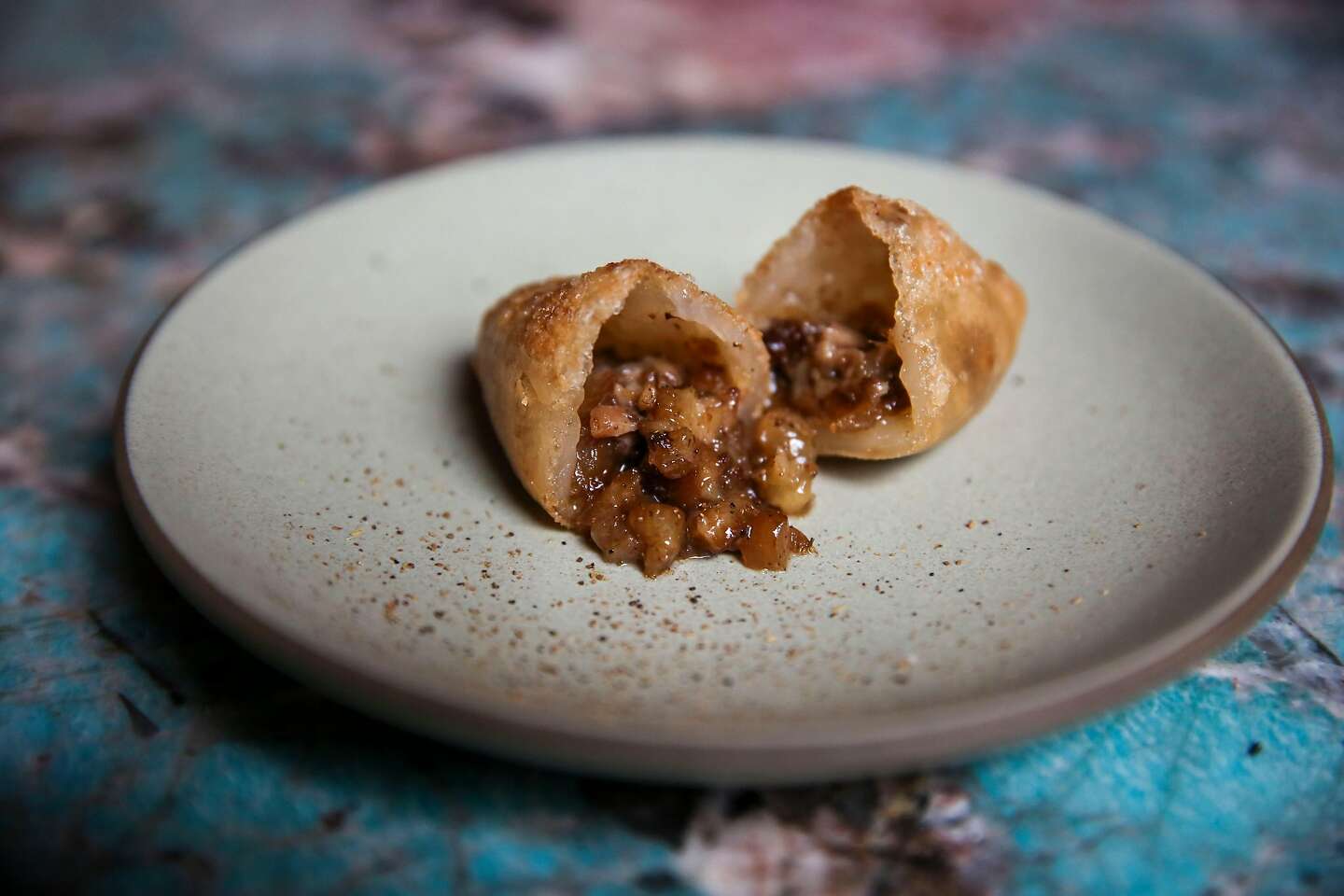 Chronicle critics review Moongate Lounge, the bar above Mister Jiu's in ...
