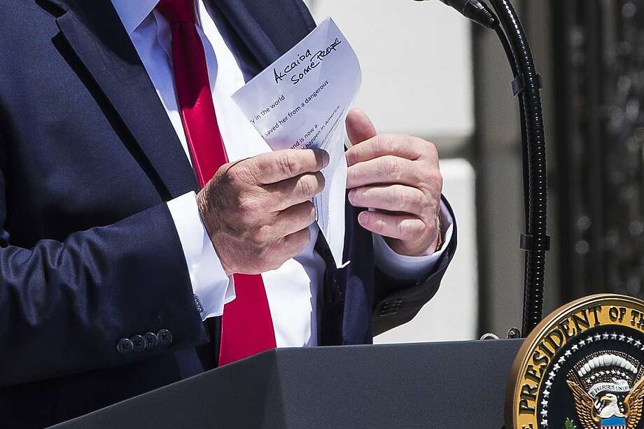 Photographer magnifies pictures, reveals Trump's notes from off-the ...