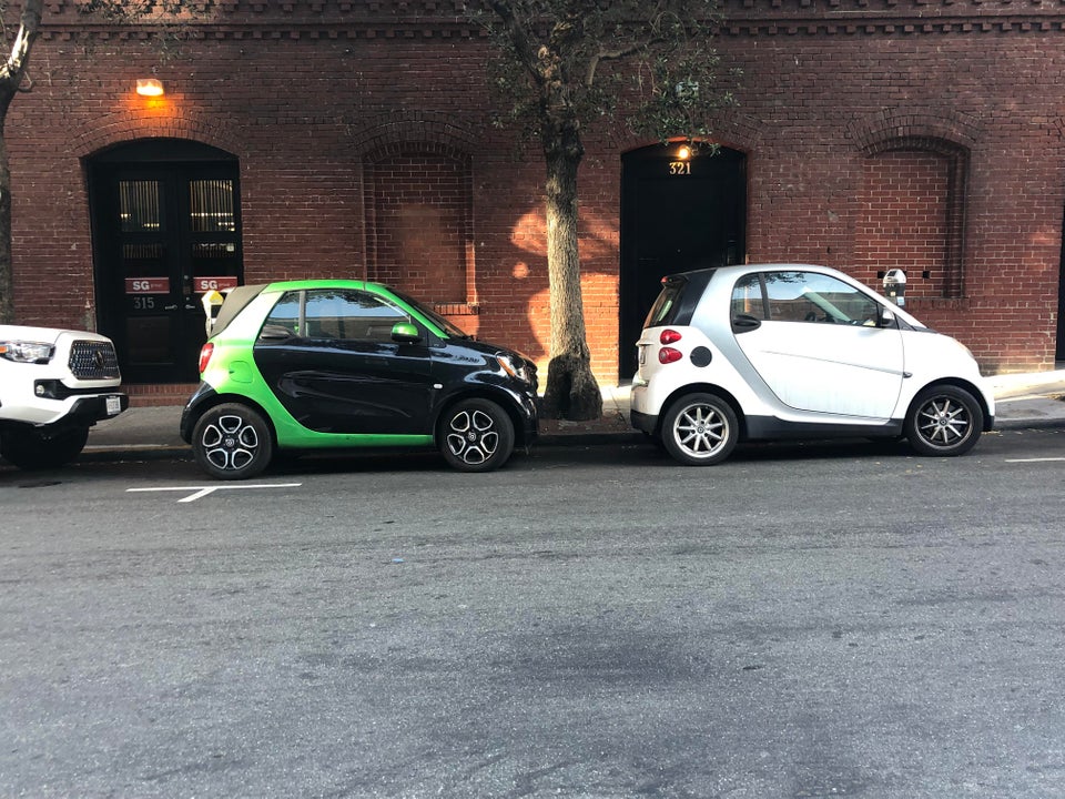 Double parked? Which one of these cars should get a ticket?