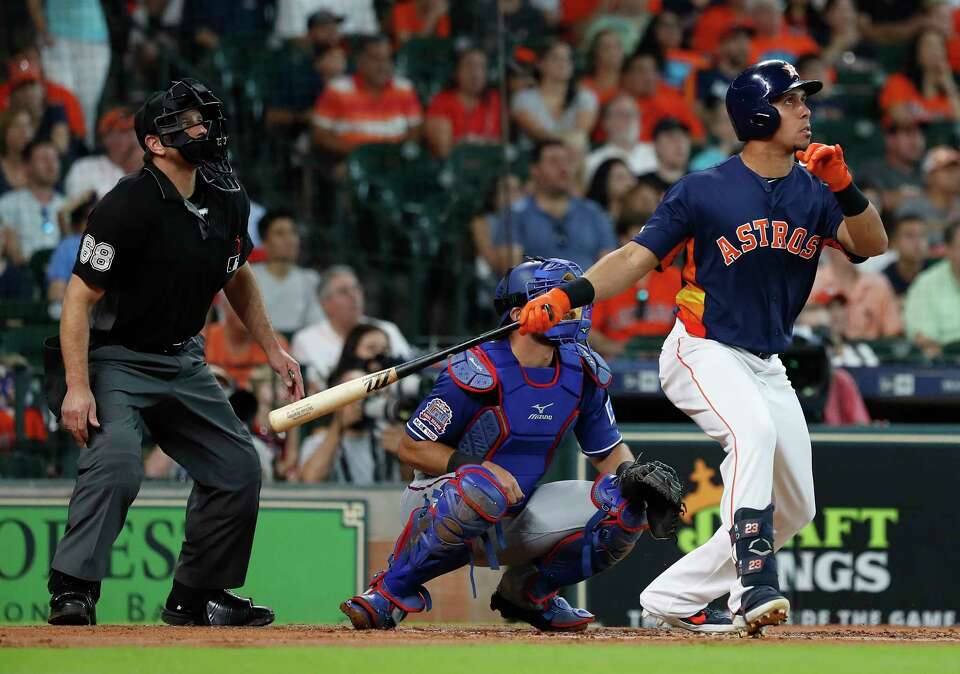 Michael Brantley homers twice, Astros hang on to sweep Rangers