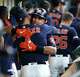 Michael Brantley homers twice, Astros hang on to sweep Rangers