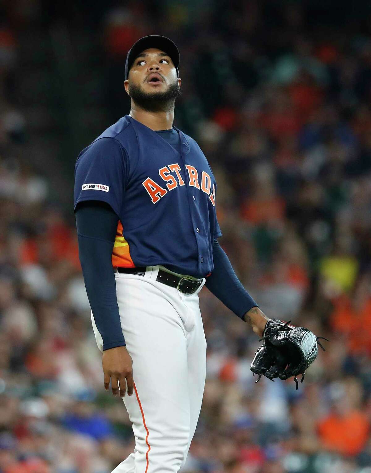 Michael Brantley homers twice, Astros hang on to sweep Rangers