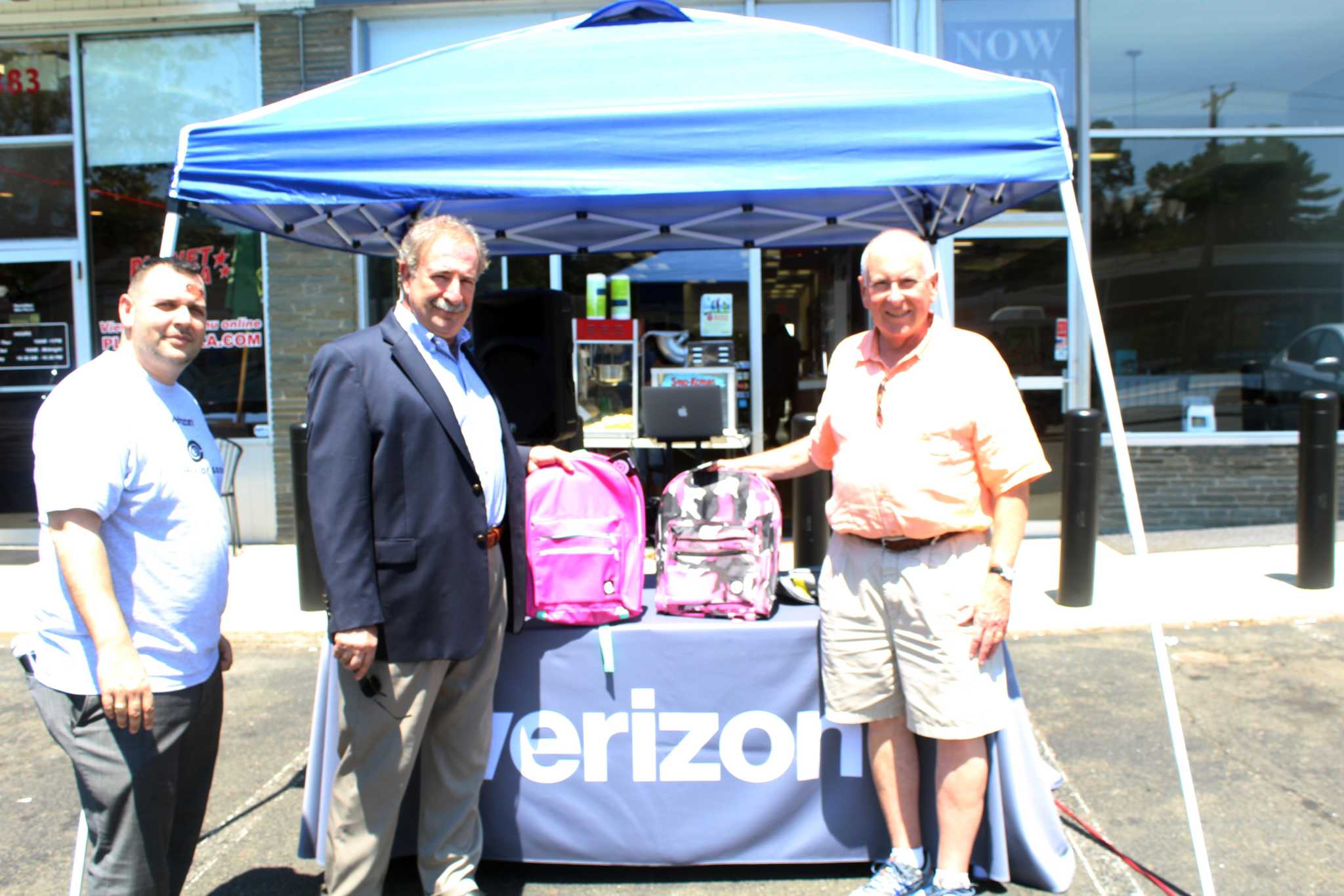 Kids get free backpacks at giveaway event