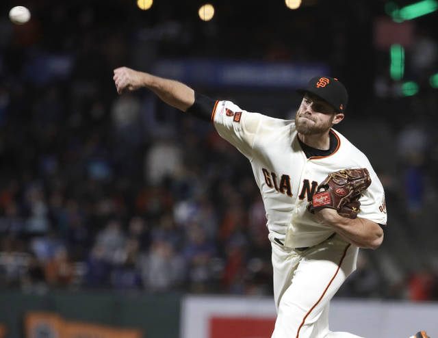 Perfect 13th inning beats Cubs, gives Carrollton native Coonrod first ...