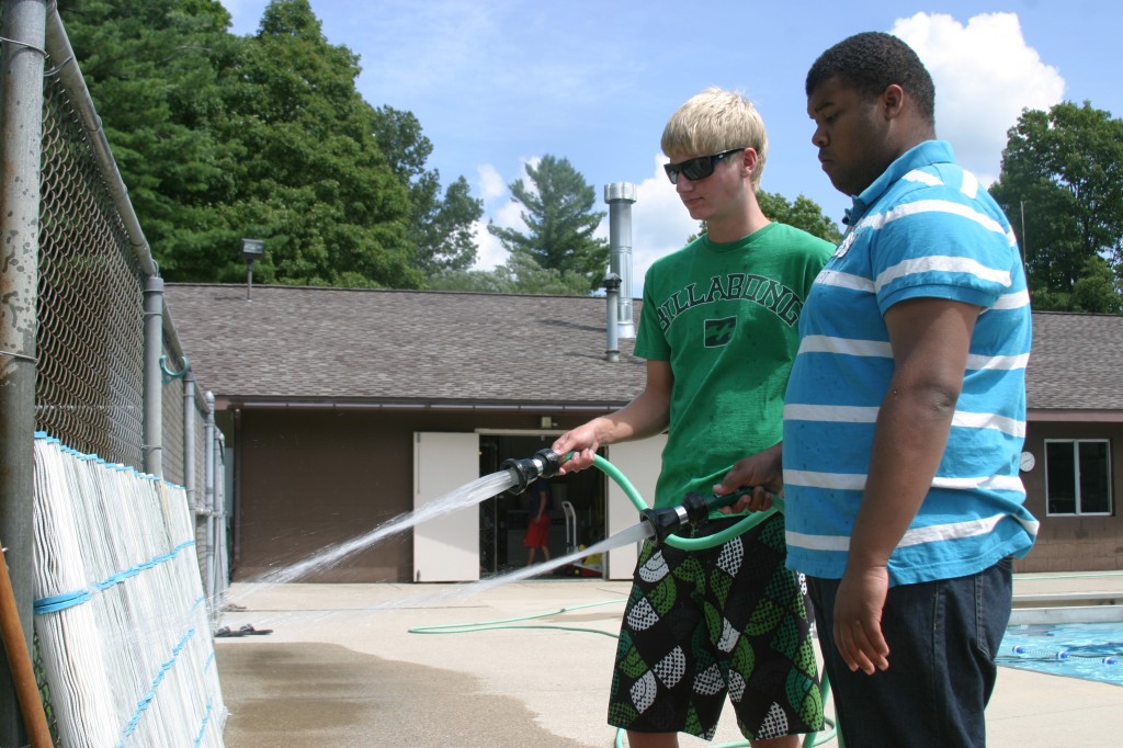 Staff prepares community pool for off-season