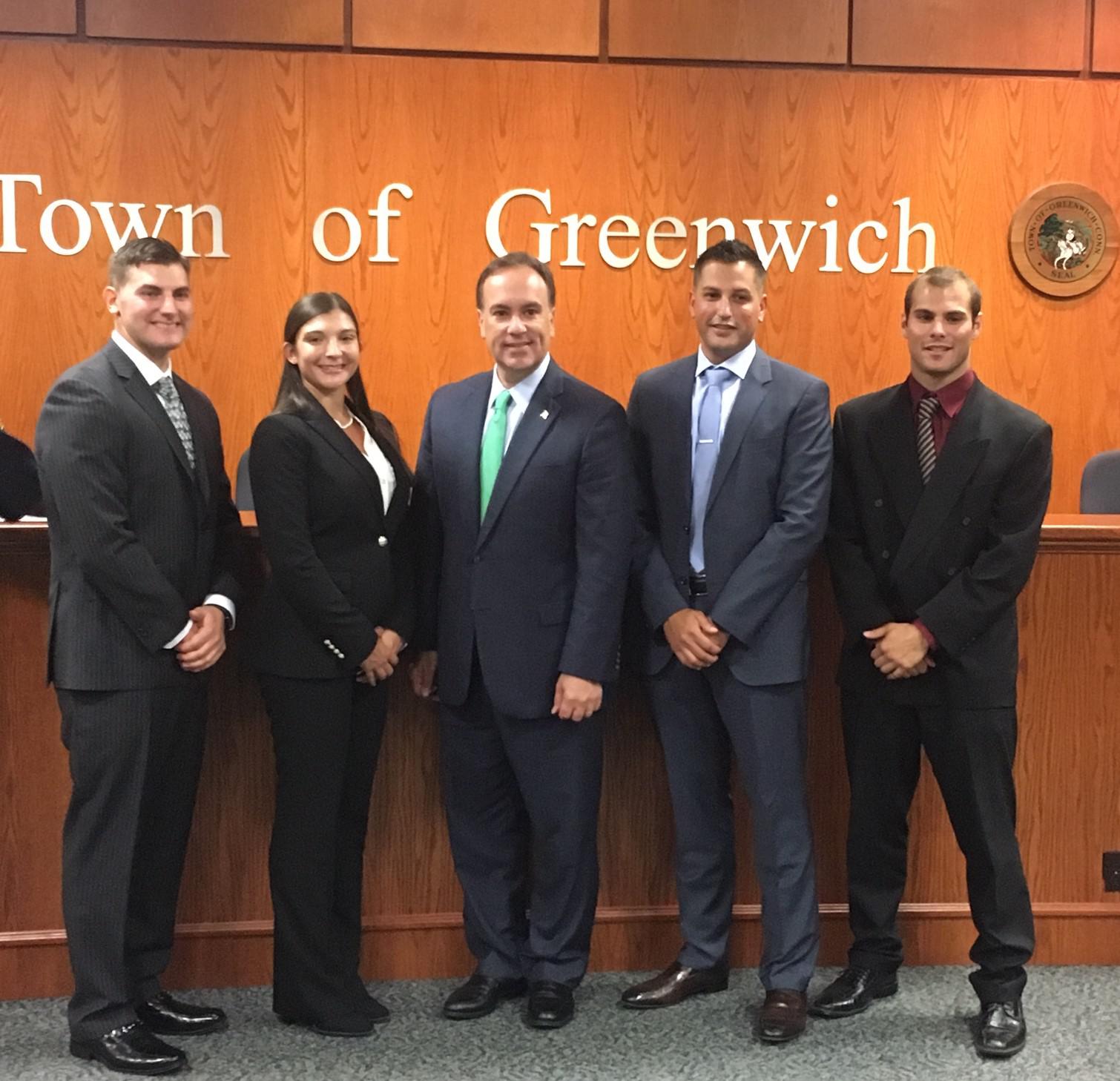 Greenwich police swear in four new recruits as officer-candidates