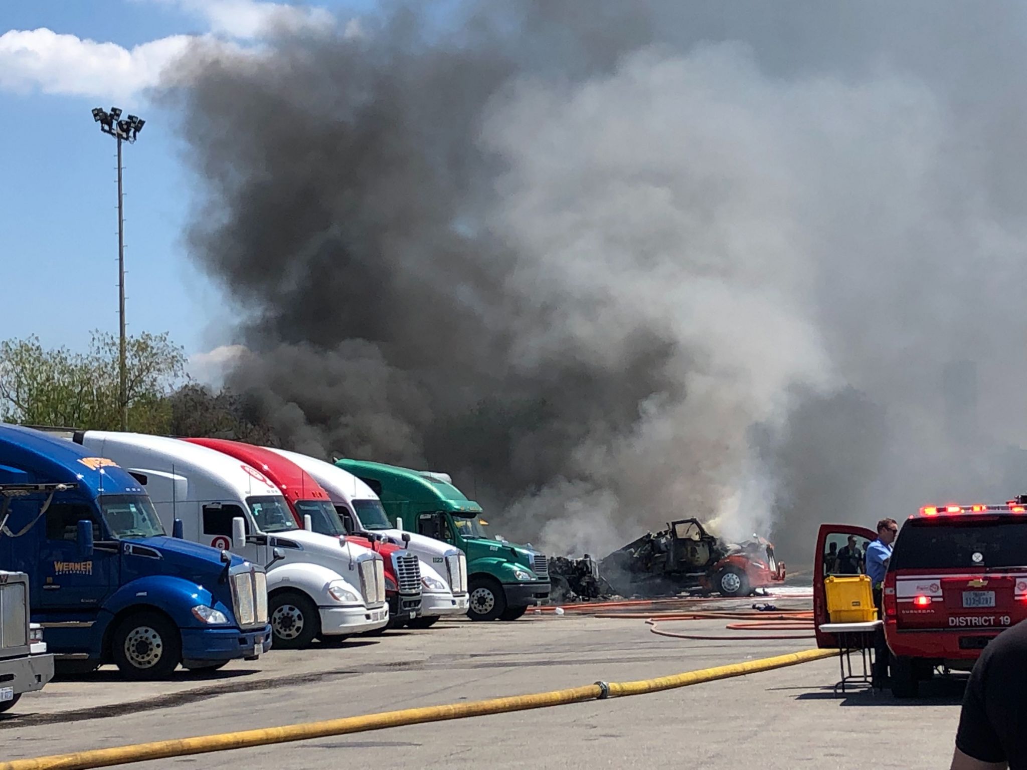 Firefighters battle 18-wheelers blaze at North Freeway truck stop ...