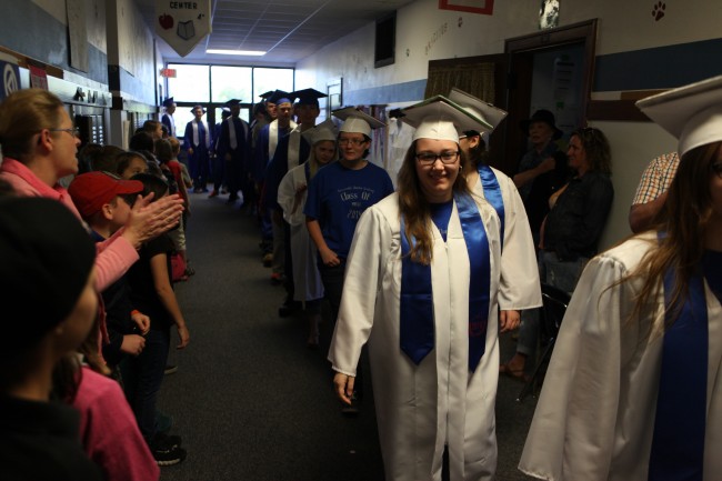 Award ceremony and parade commemorate academic achievement