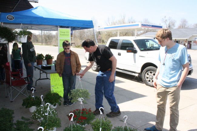 Boy Scouts selling flowers to earn money for camp