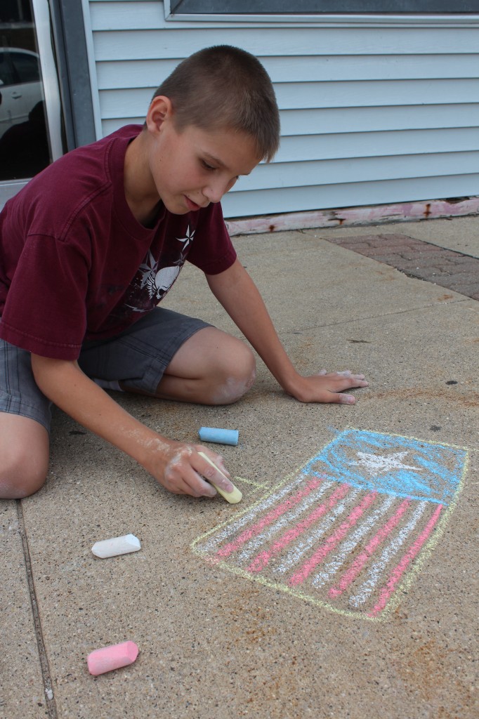 Evart residents chalk the town