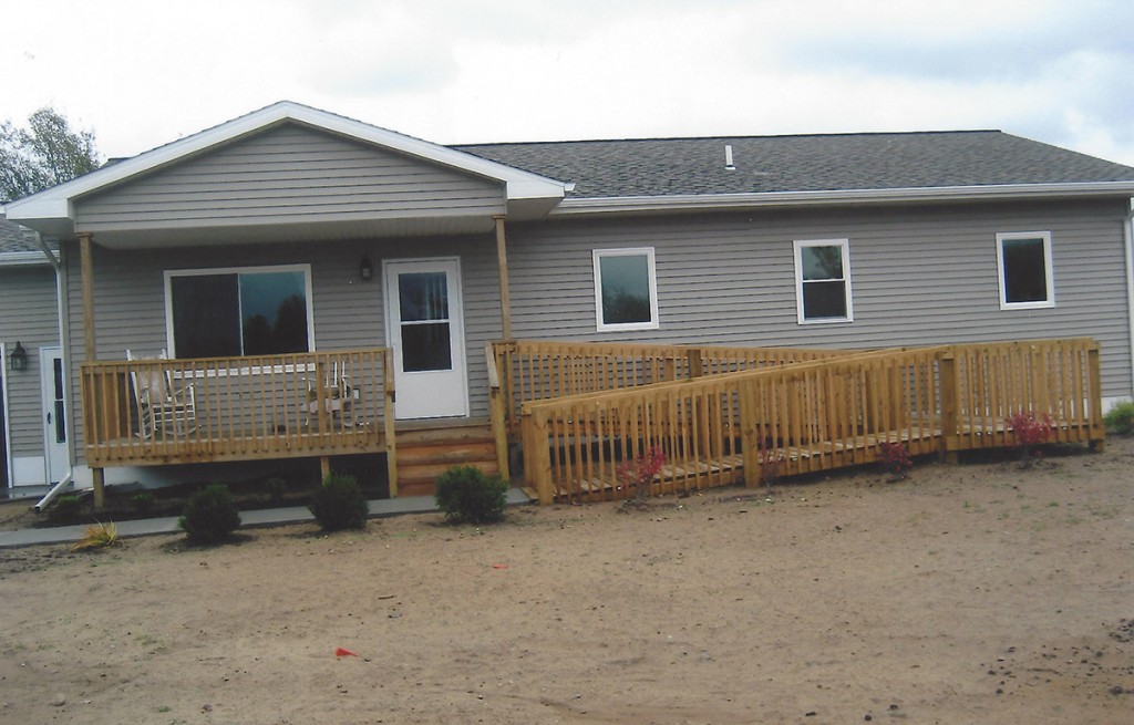 Habitat dedicated home to family