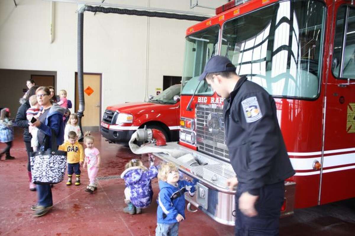 Preschoolers visit the firefighters
